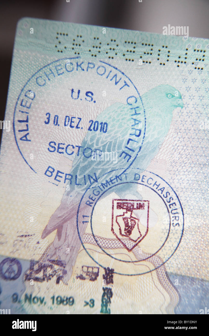 Fake border stamps in a passport; Checkpoint Charlie, Berlin at the old ...