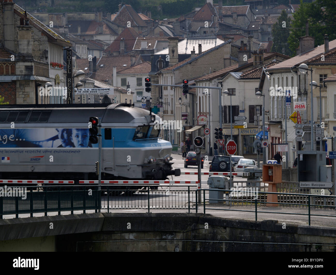 SNCF Train passing through the city centre of the town Joinville, Haute ...