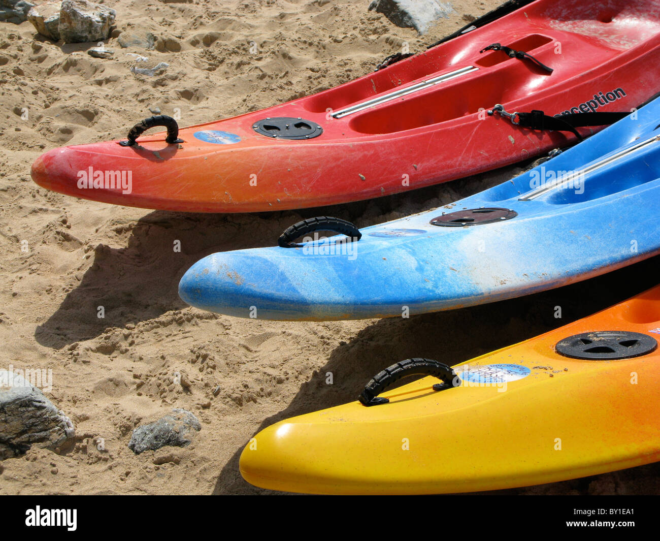 CANOES ON THE BEACH Stock Photo - Alamy