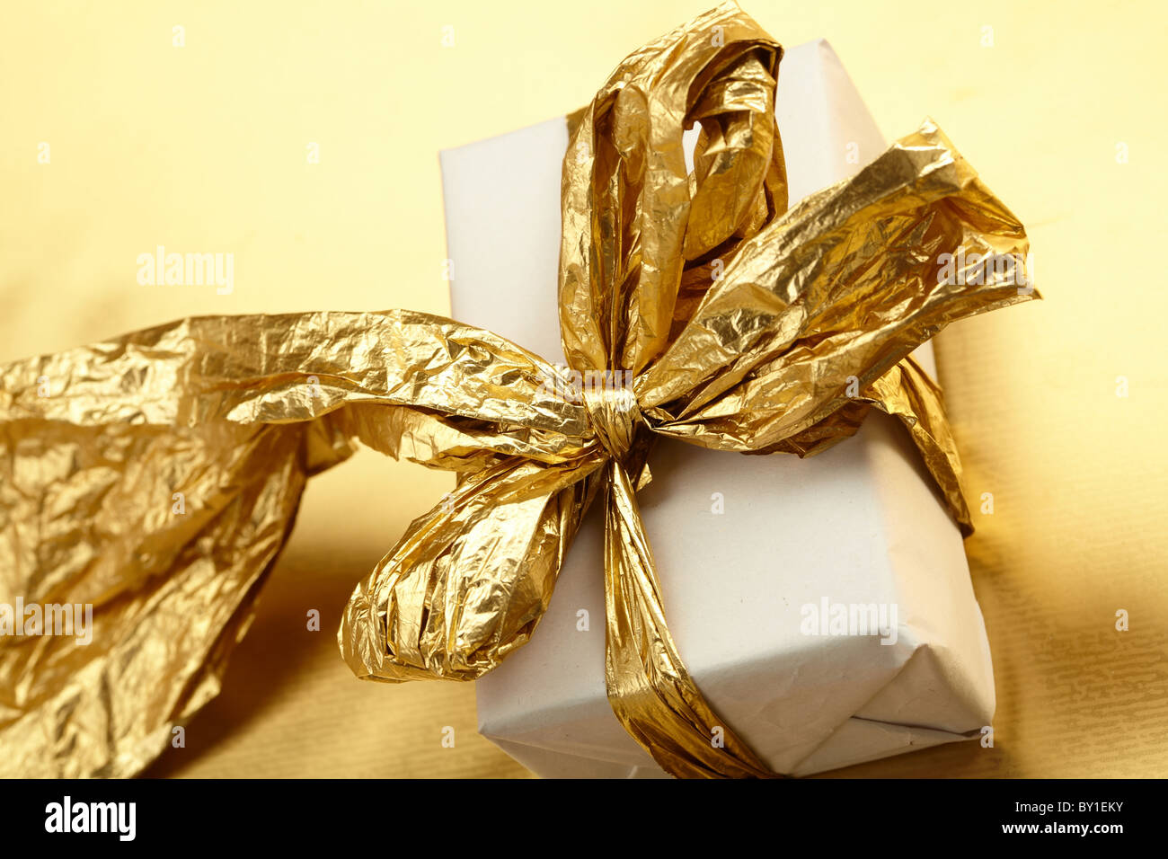 gift box with gold ribbon Stock Photo - Alamy