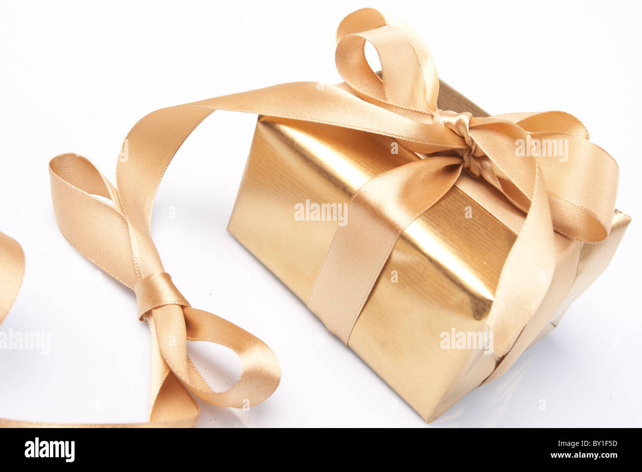 Golden gift box ribbon hi-res stock photography and images - Alamy