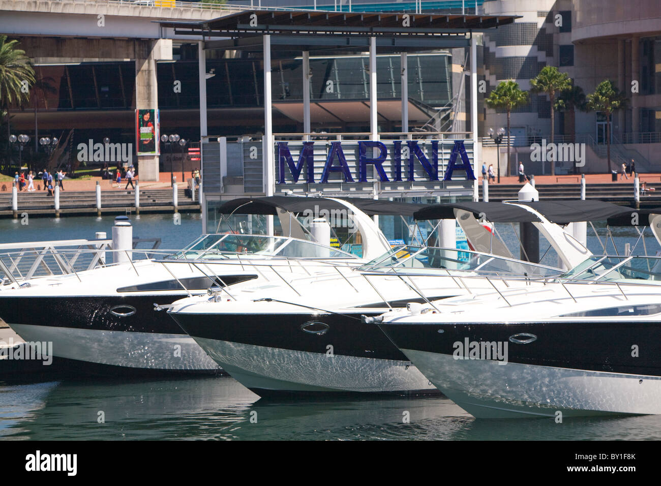 three identical boats aligned at the marina in Darling Harbour,Sydney ...