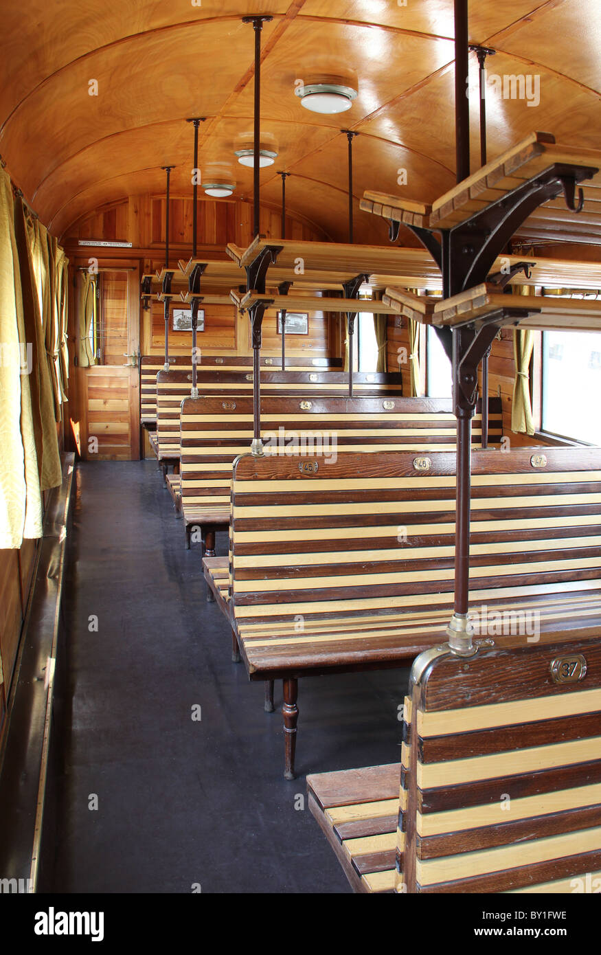 Low-cost rail car interior as the 60's Stock Photo - Alamy