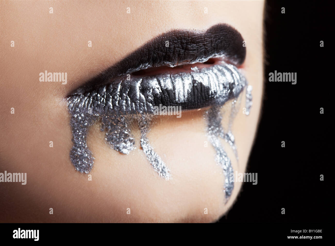 Caucasian woman silver body paint hi-res stock photography and images ...