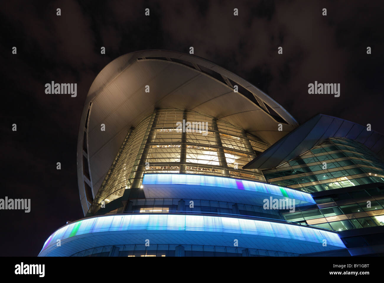 Hong Kong Convention and Exhibition Centre illuminated at night Stock ...