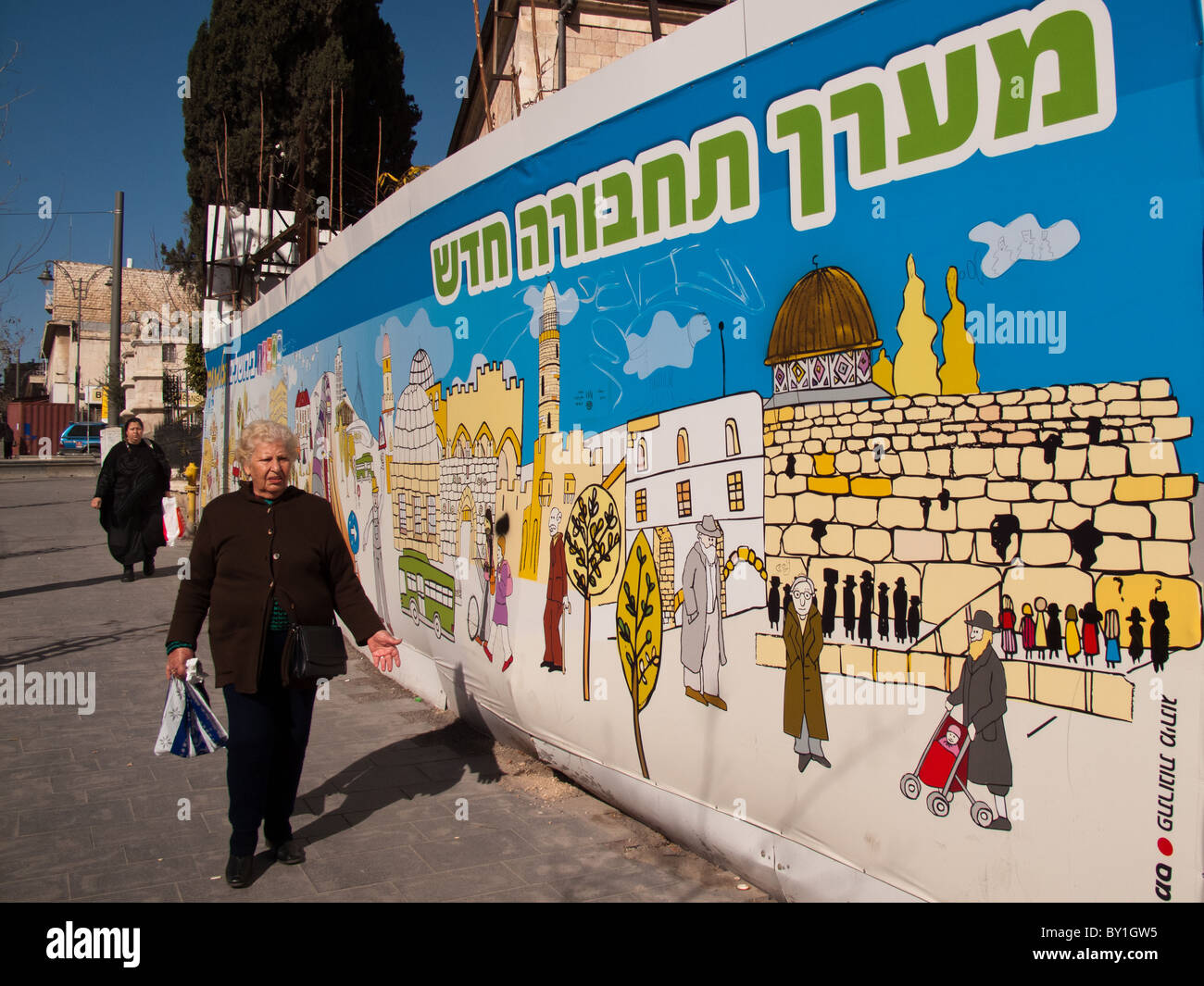 A large banner explains the new public transportation system to ...