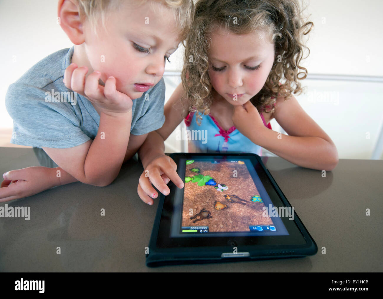 Boy Playing Games On Ipad