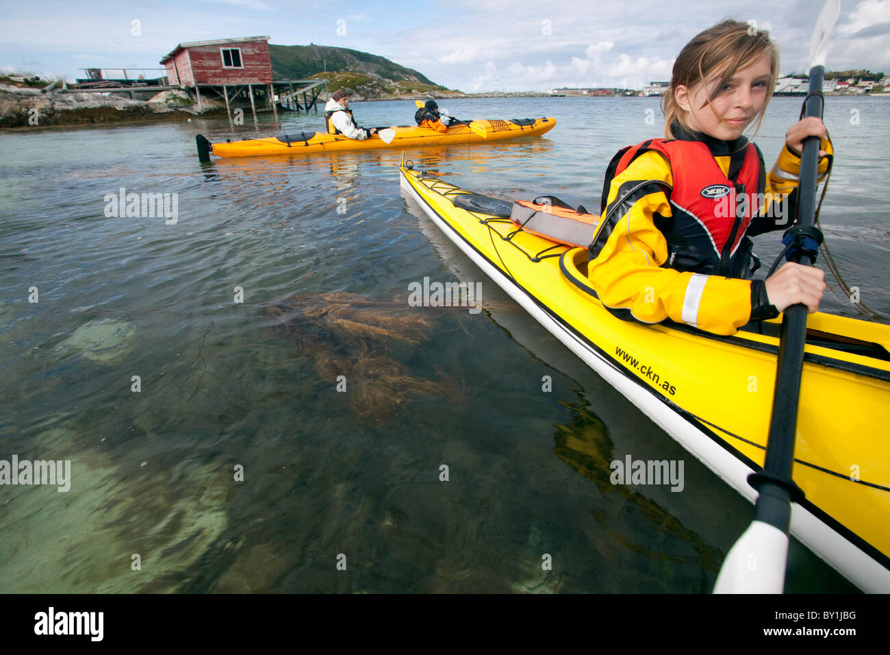 Norway, Tromso Region, Island of Sommørøy. A norwegian family take to ...