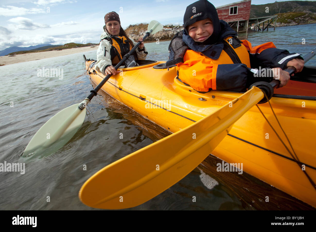 Norway, Tromso Region, Island of Sommørøy. A norwegian family take to ...