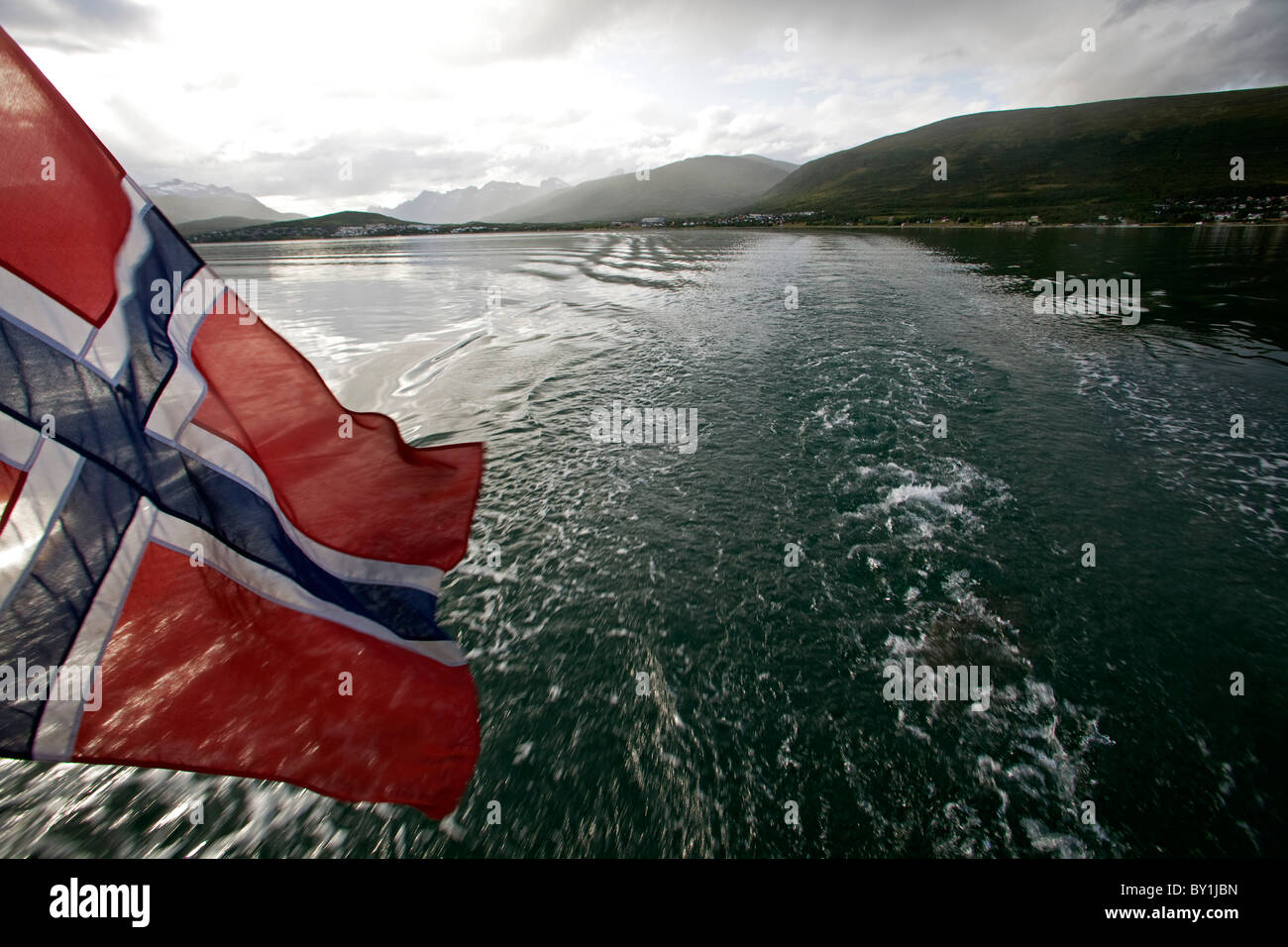 Norway, Tromso Region, sailing on a summer day through the Norwegian ...