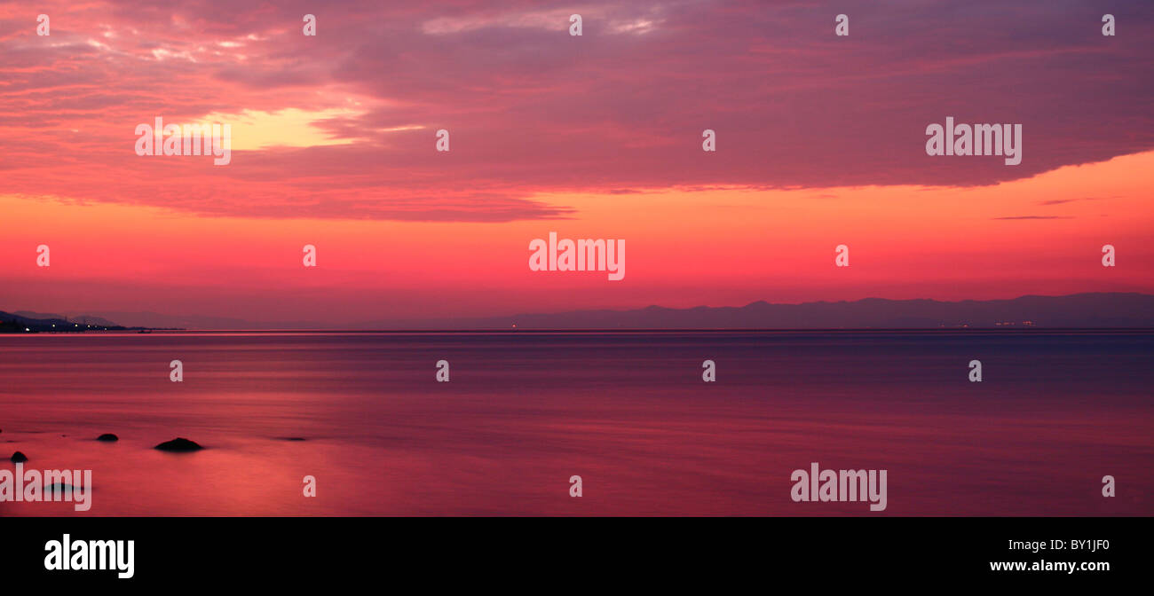 Pink Sunrise By The Seaside Stock Photo - Alamy