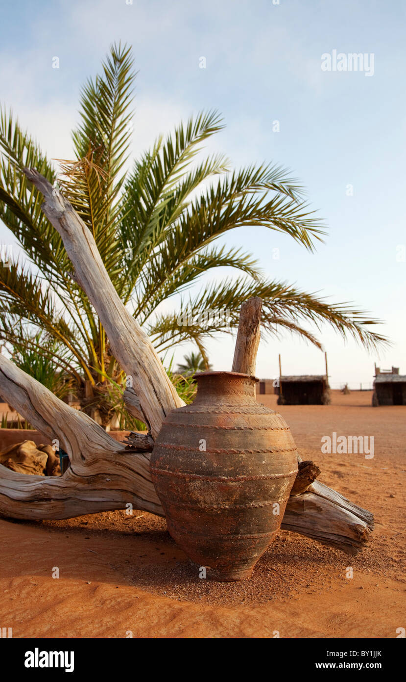 Oman, Wahiba Sands. An ornamental pot in the Nomadic Desert Camp Stock ...