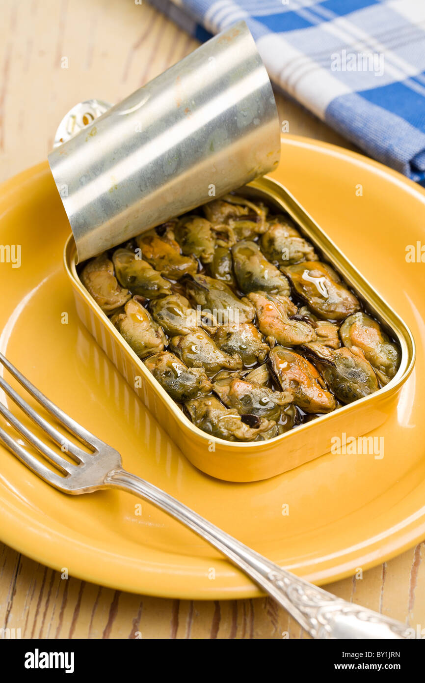 the smoked mussels in opened tin can Stock Photo - Alamy