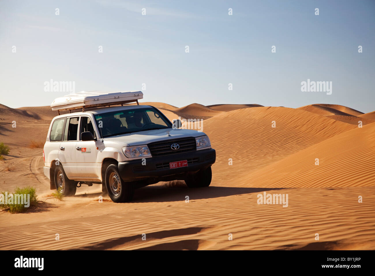Oman, Empty Quarter. Driving through the vast dunes of the Empty ...