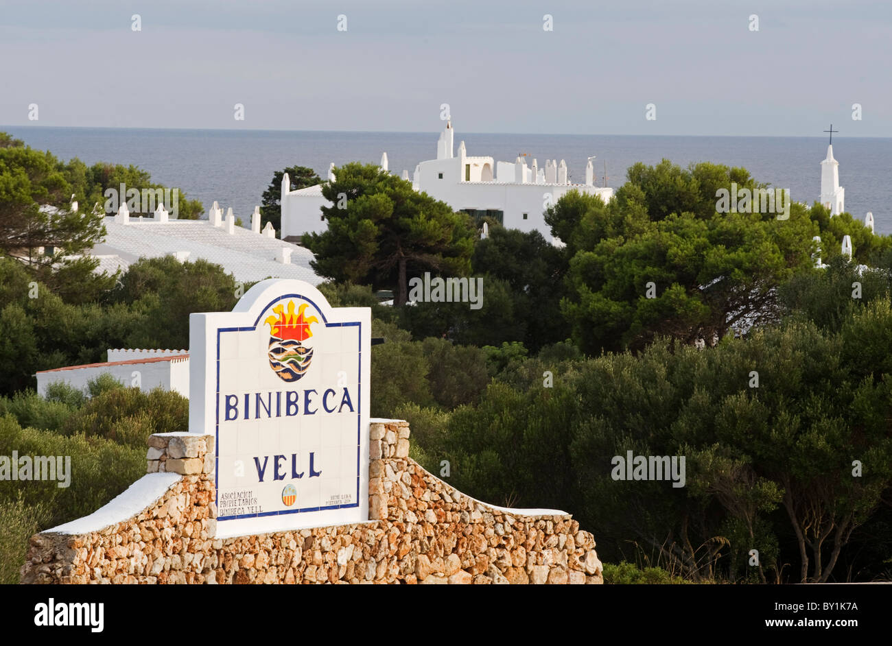 Spain, Menorca, Binibeca. The village of Binibeca looks out over the ...