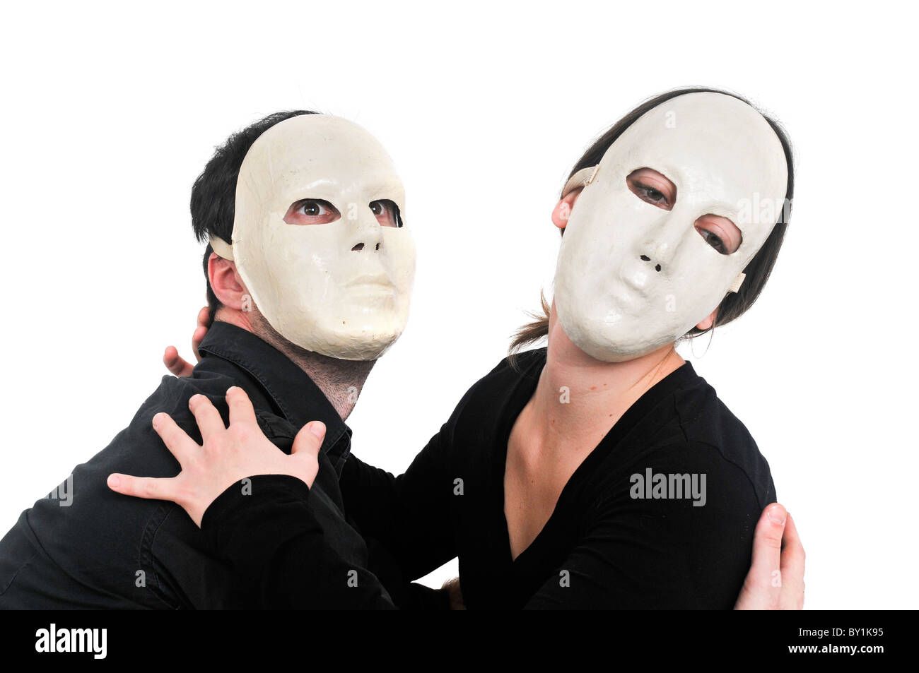 Masked actors in a physical theatre on white background Stock Photo - Alamy