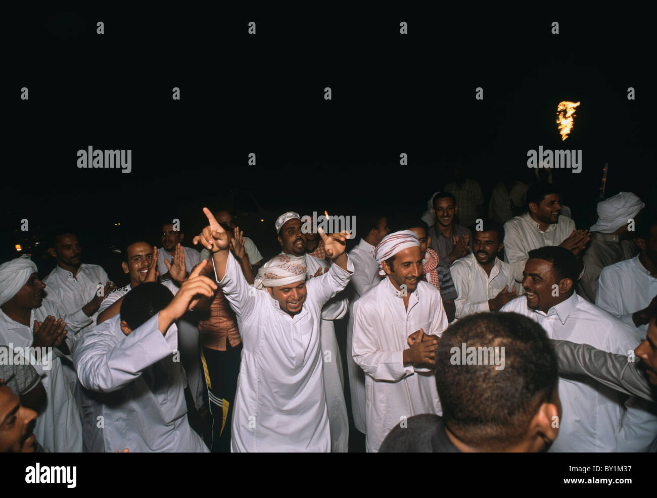 Bedouin groom dances in traditional wedding street procession to the ...