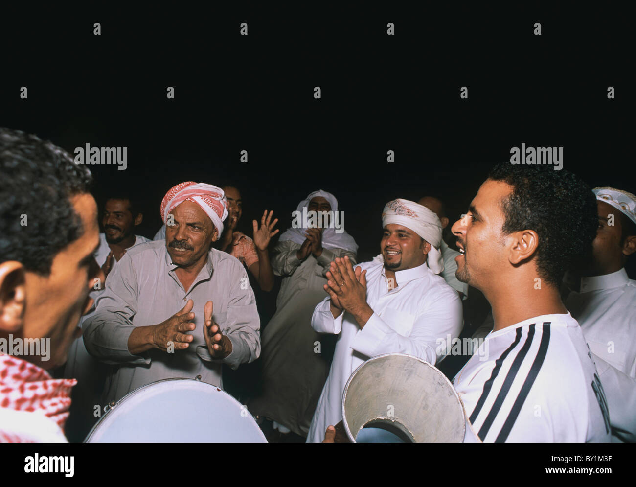 Bedouin groom dances in traditional wedding street procession to the ...