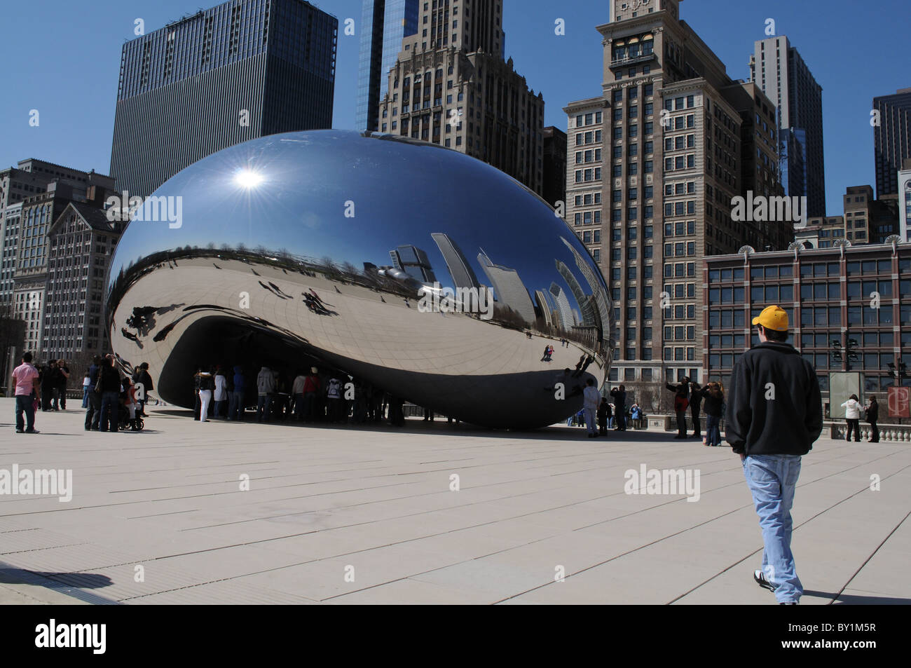 Cloud Gate, or The Bean, in Chicago's Millennium Park draws a crowd ...