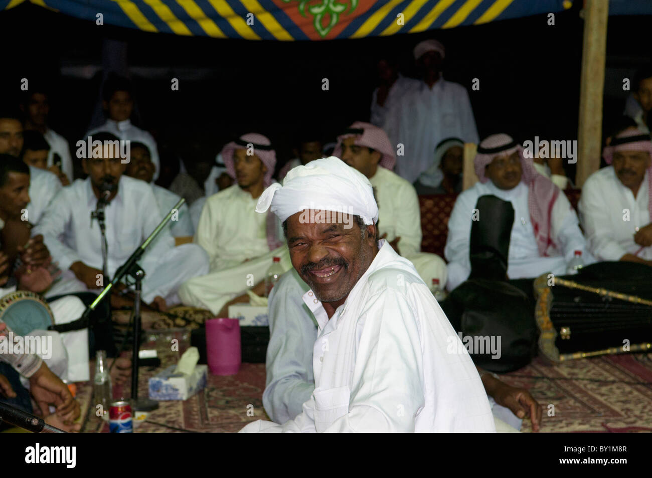Guest enjoying celebration at traditional Bedouin wedding. El Tur ...