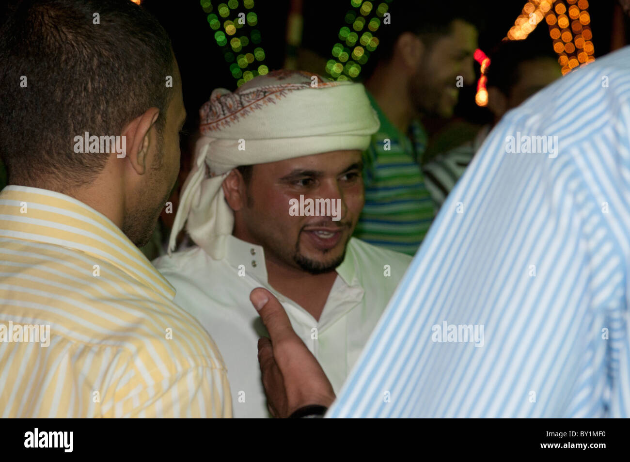 Bedouin groom receives guests during traditional wedding celebration ...