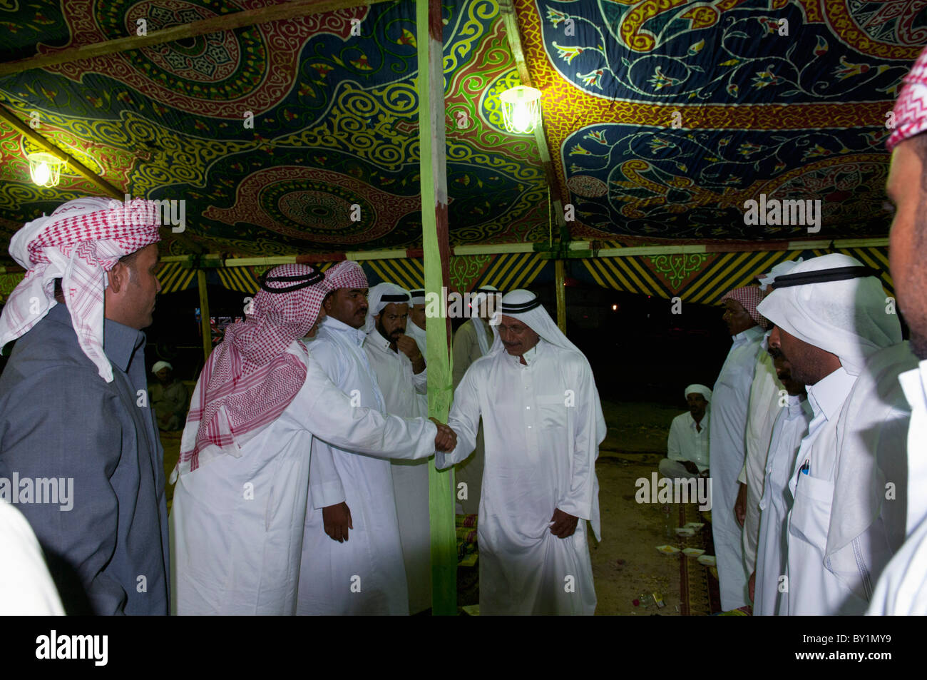 Bedouin sheikh formally receives guests during traditional wedding ...