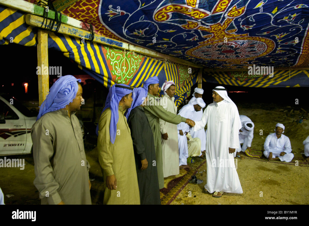 Bedouin sheikh formally receives guests during traditional wedding ...