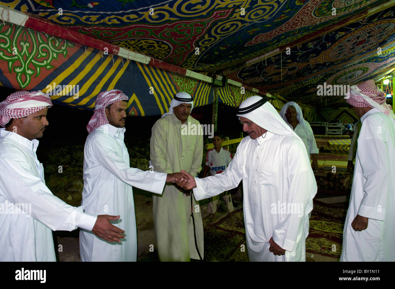Bedouin sheikh formally receives guests during traditional wedding ...