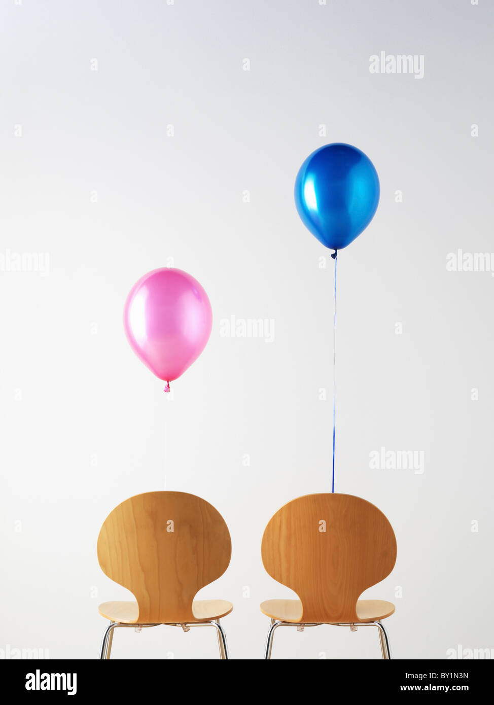 Office Chairs and balloons Stock Photo - Alamy