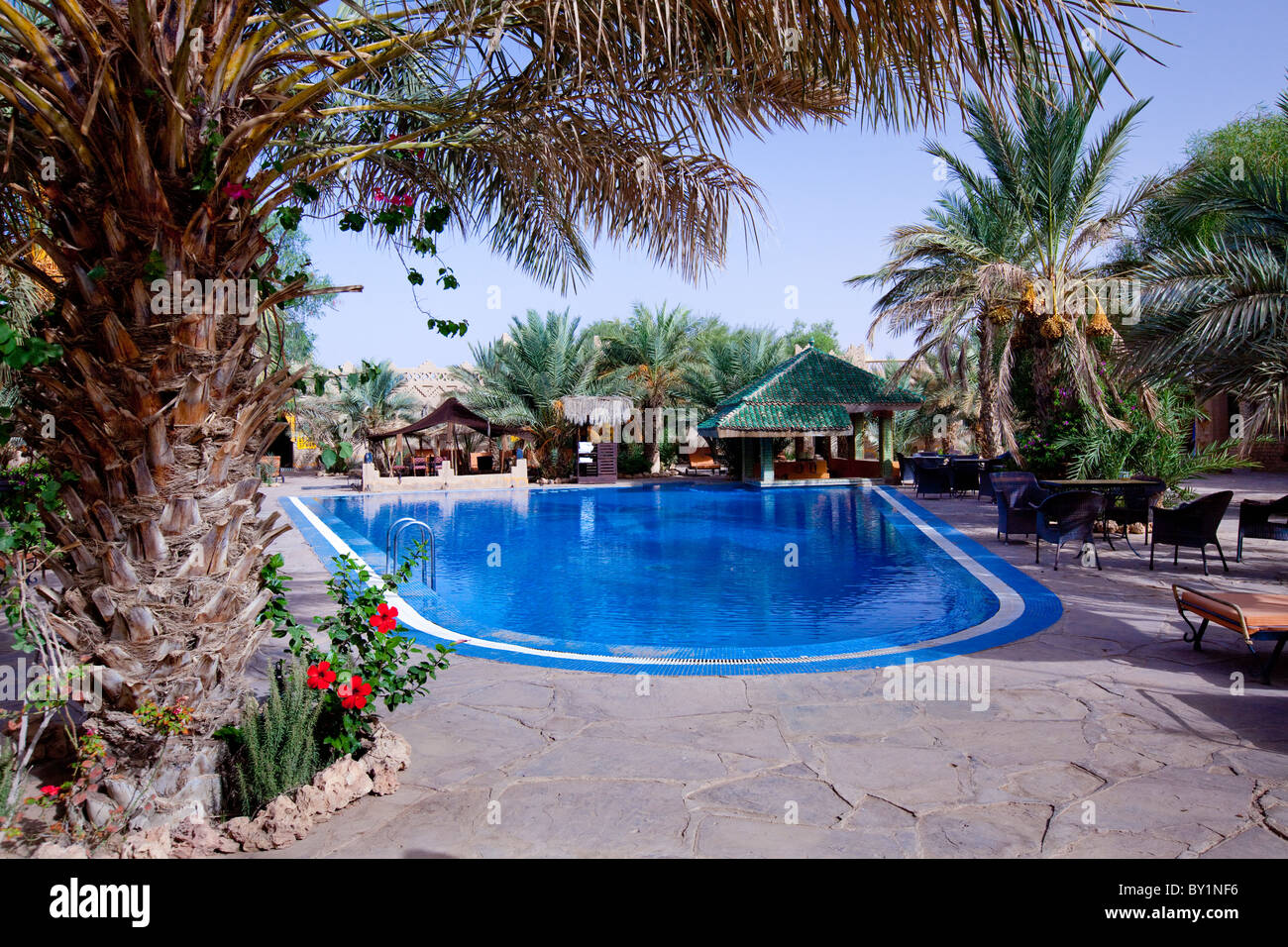 The swimming pool area of the Hotel Kasbah Xaluca in Erfoud, Morocco ...
