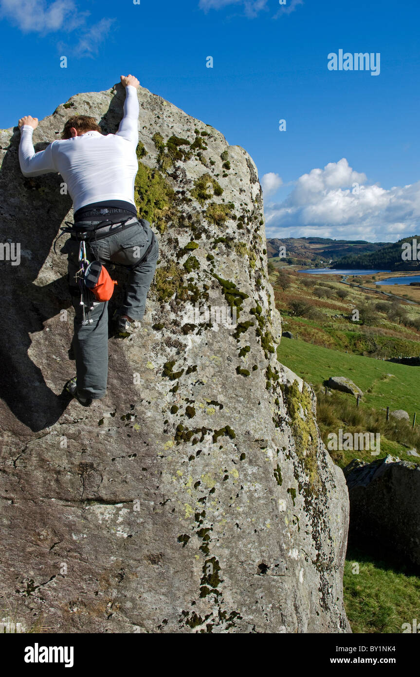 Man climbing rock wales hi-res stock photography and images - Alamy