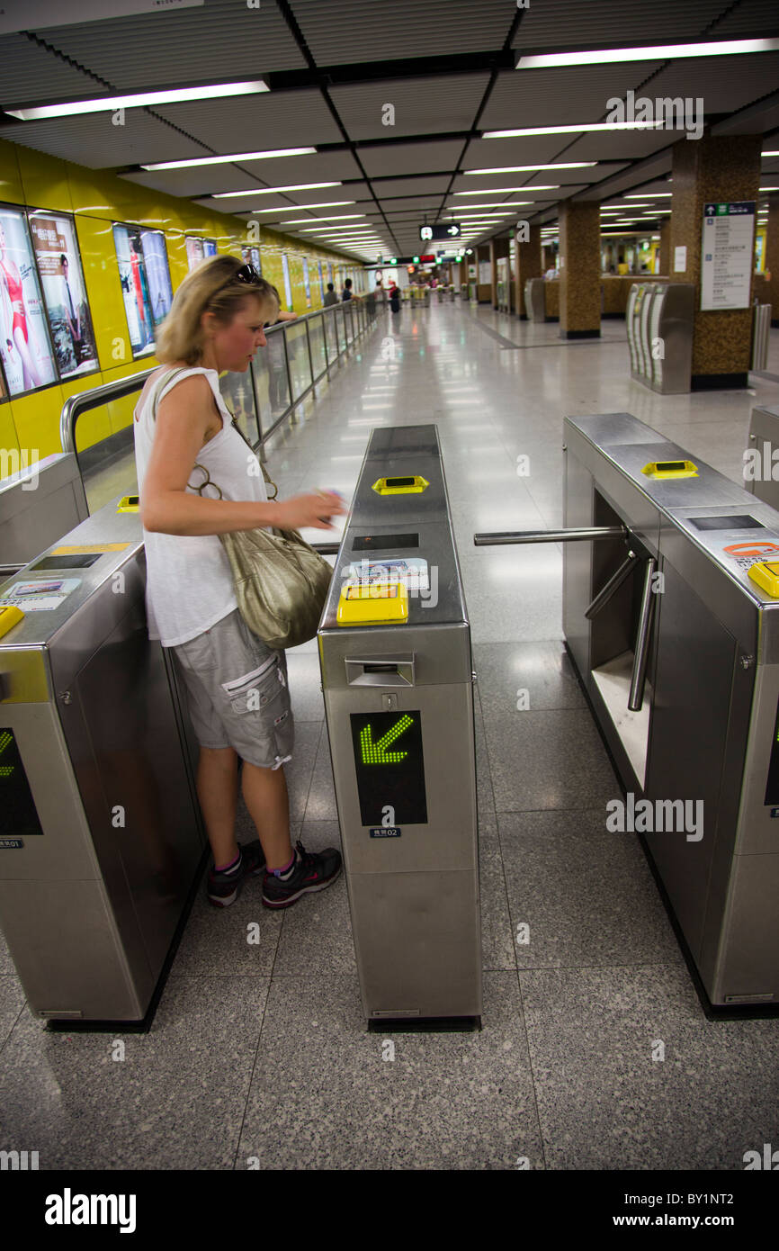 Detail of octopus card user and machine scanner MTR Train route on Hong ...