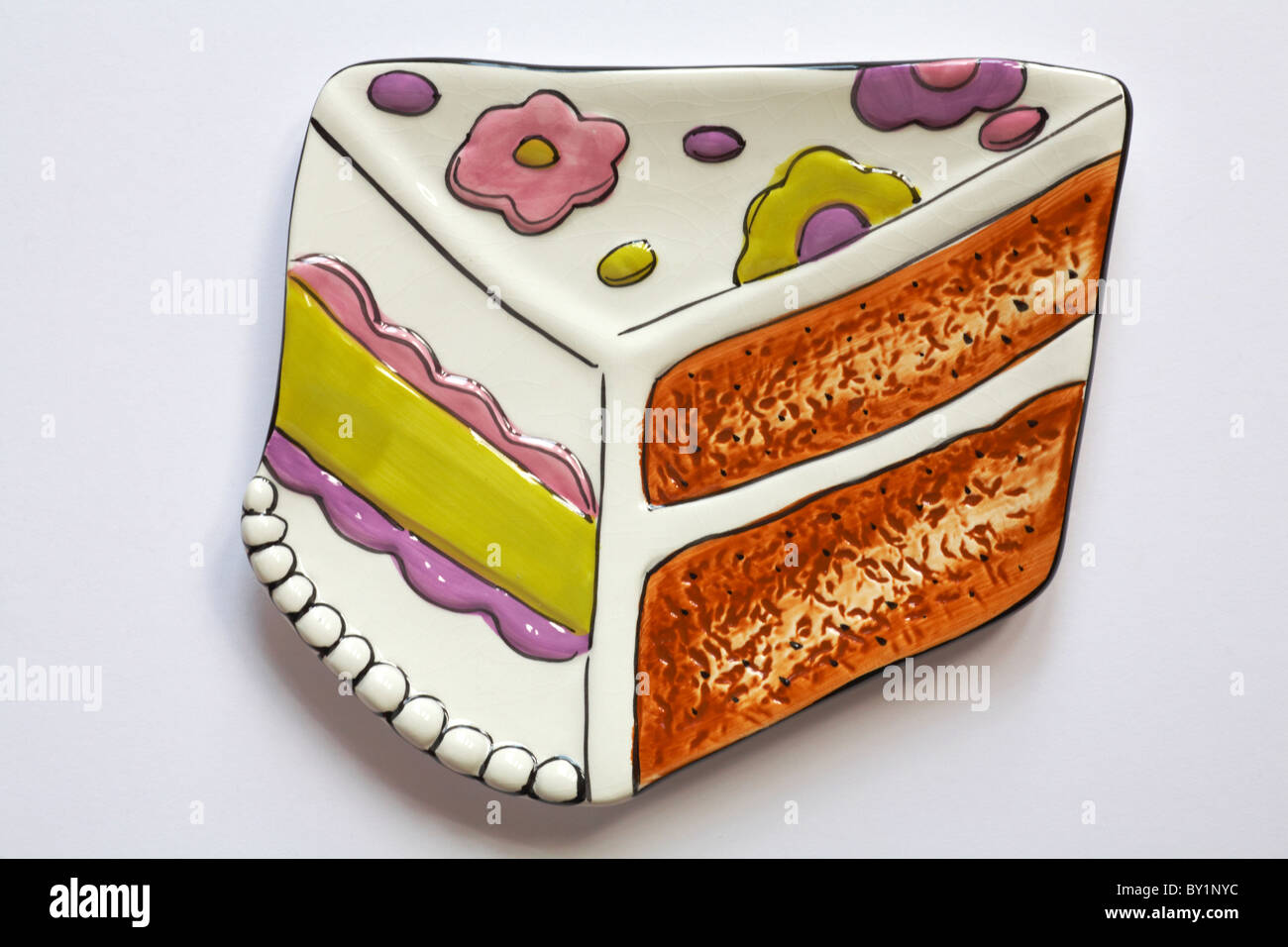 Pretty cake shape decorative plate isolated on white background Stock ...