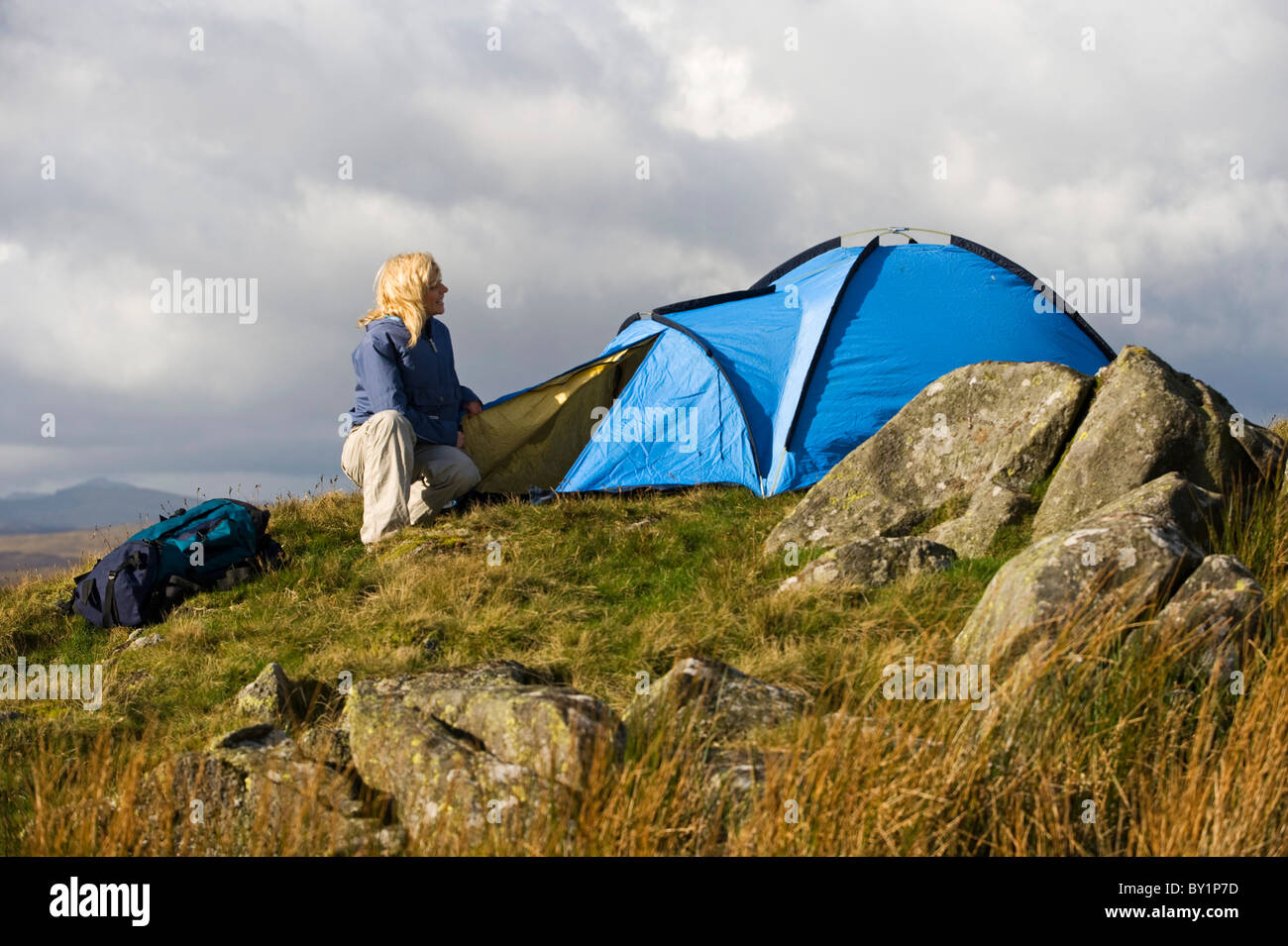 Woman girl setting up tent hi-res stock photography and images - Alamy