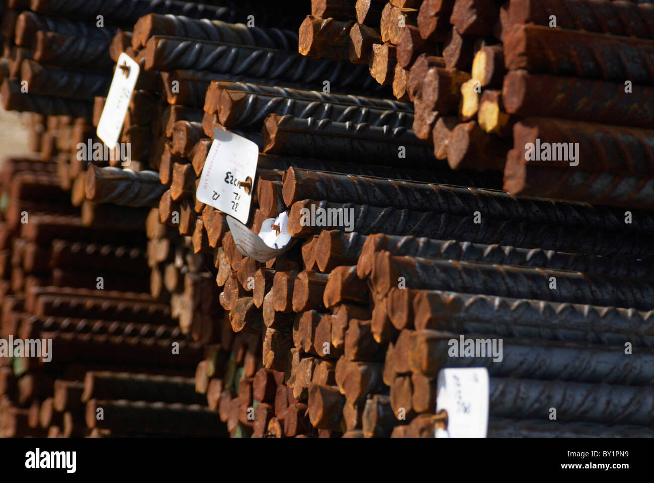 Concrete reinforcement: stack of steel rebar cut and bent Stock Photo ...