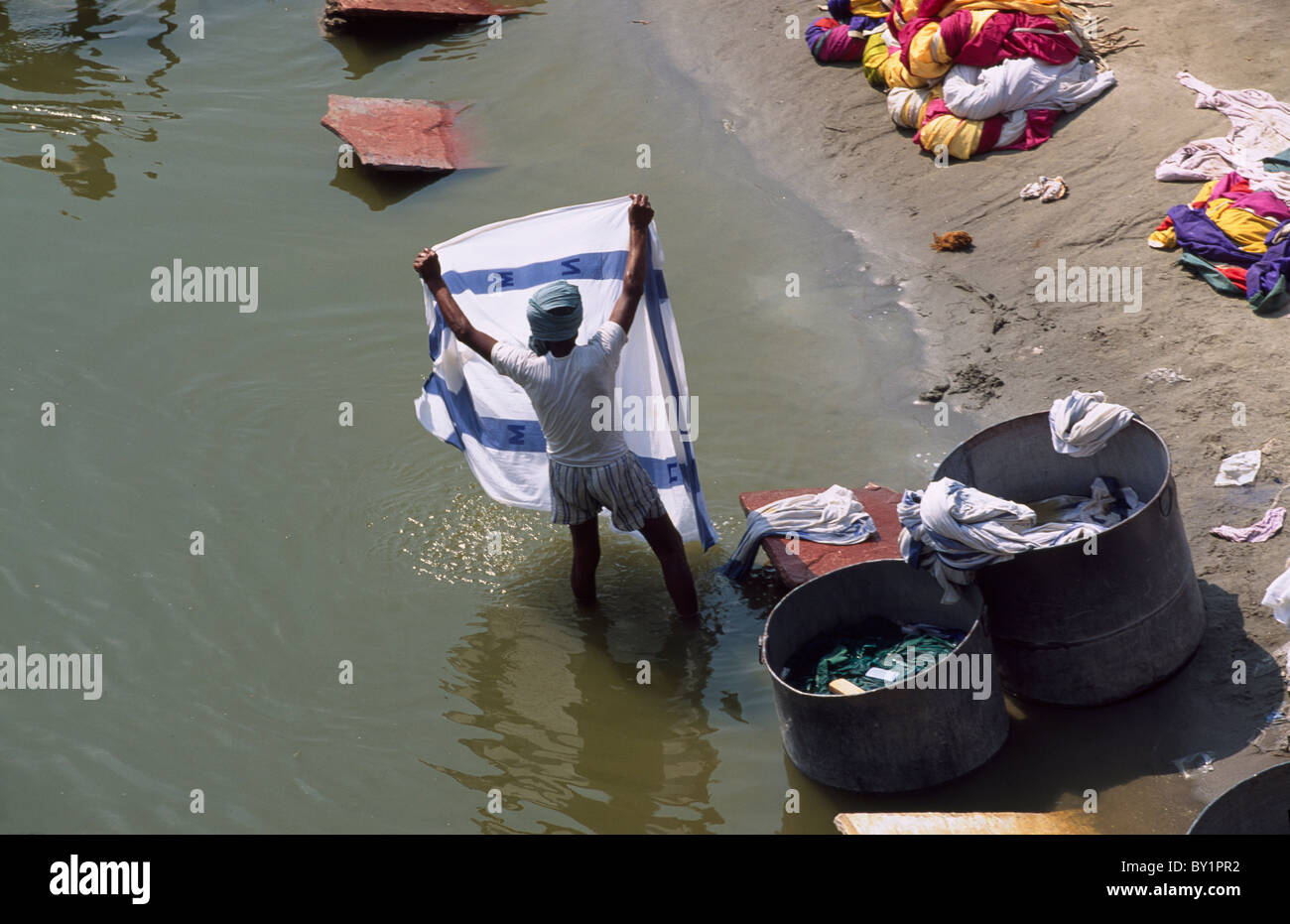 Laundrymen at Yamuna River in Agra, Uttar Pradesh, India Stock Photo ...