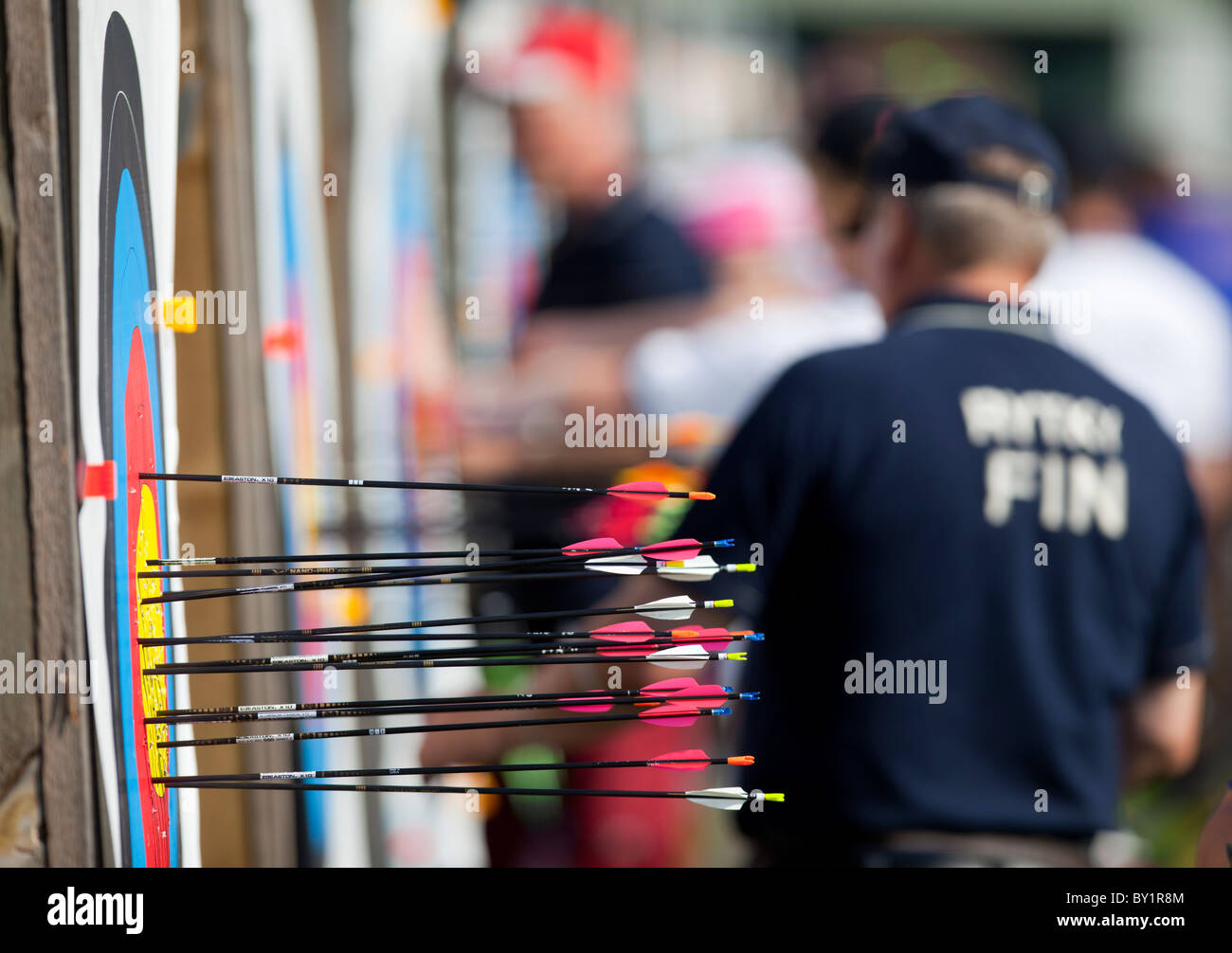 Standard FITA archery target and arrows shot to it , competitor ...