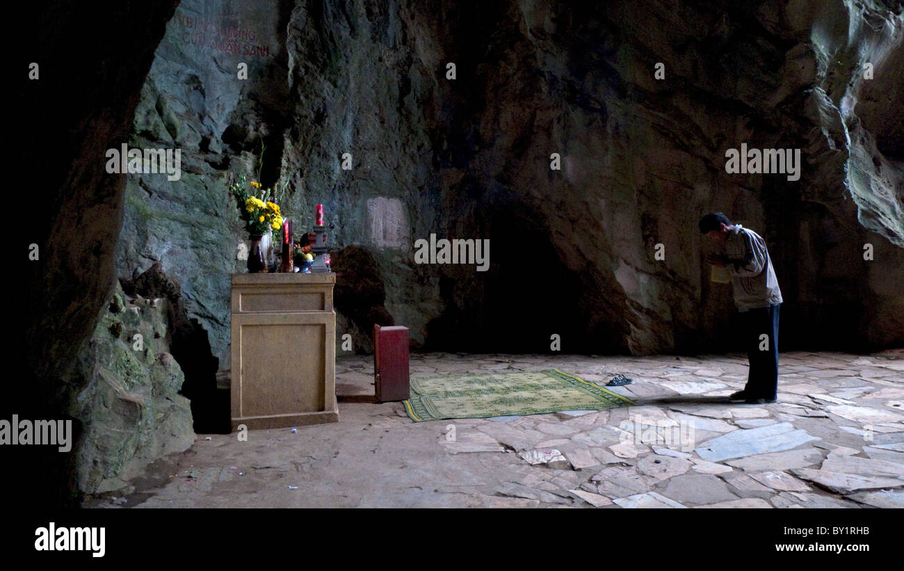 Praying inside a Cave temple, Marble Mountain, Danag, Vietnam Stock ...