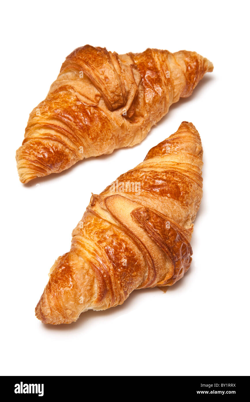 Butter croissants isolated on a white studio background Stock Photo - Alamy