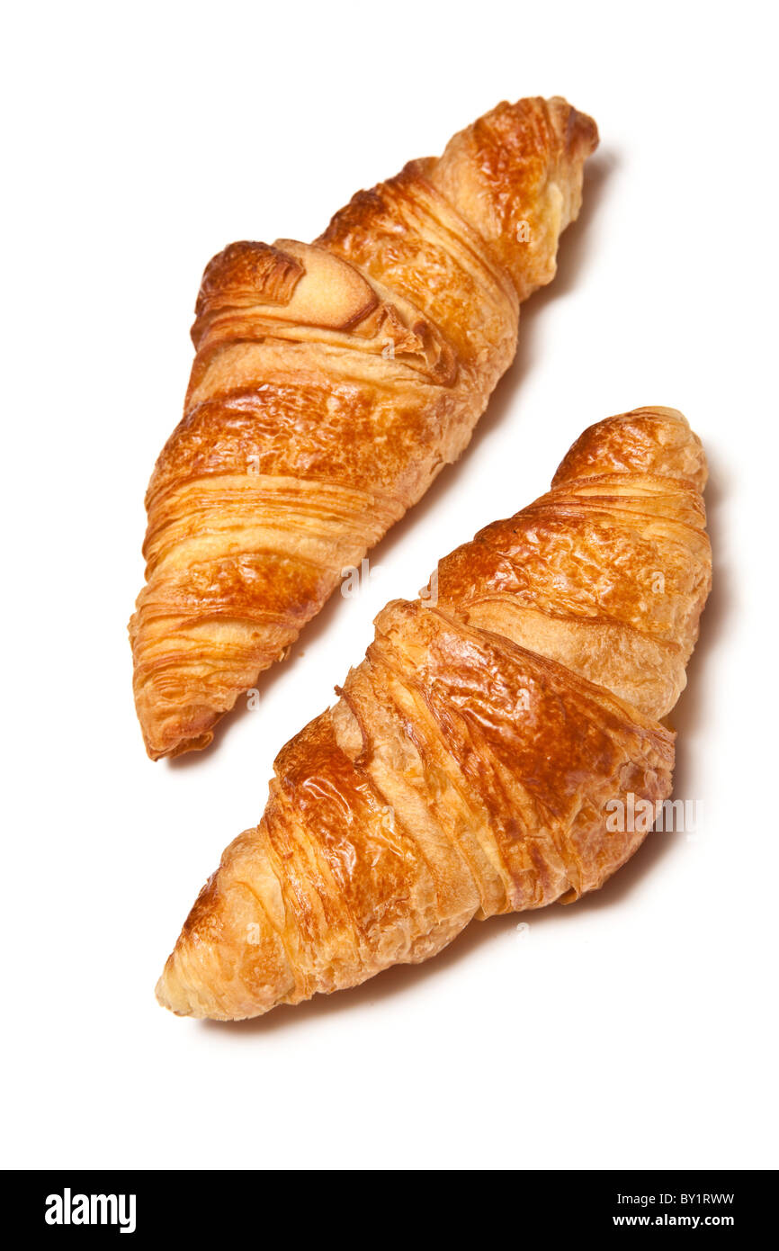 Butter croissants isolated on a white studio background Stock Photo - Alamy