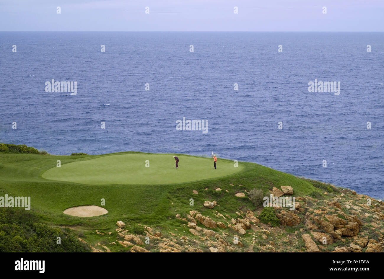 Perfect golf green hole at the sea Stock Photo - Alamy