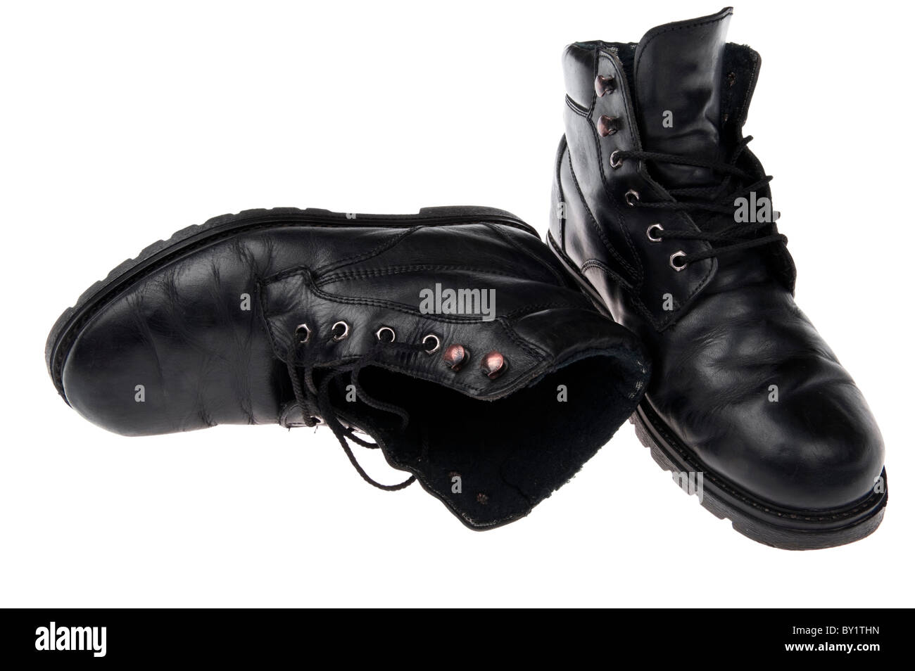 object on white - Damaged old shoes Stock Photo - Alamy