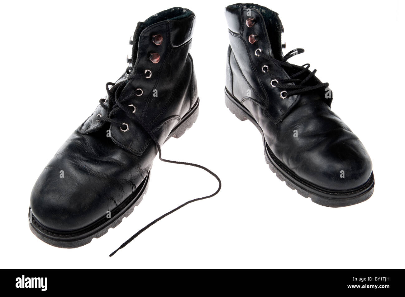 object on white - Damaged old shoes Stock Photo - Alamy