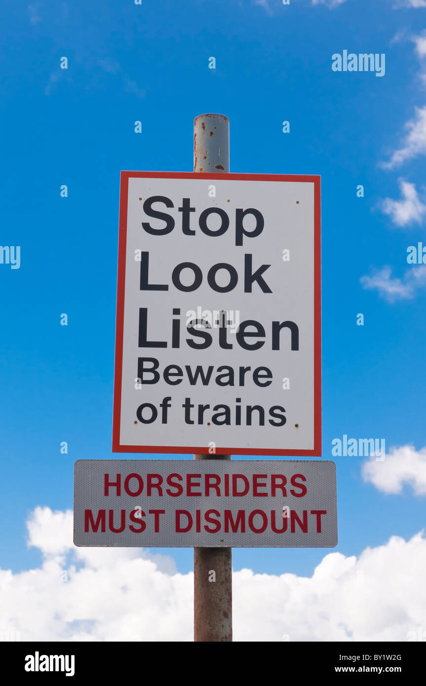 Beware of trains rail railway line sign signs hi-res stock photography ...