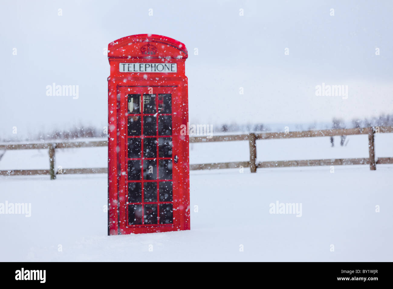 A cardboard traditional telephone box in a snow field Stock Photo - Alamy