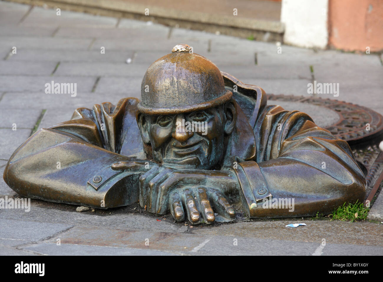 Bronze statue of Cumil the happy sewage worker, Bratislava, Slovakia ...