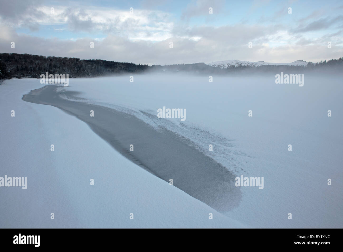 Freezing fog over a frozen Burrator reservoir on Dartmoor Devon UK ...