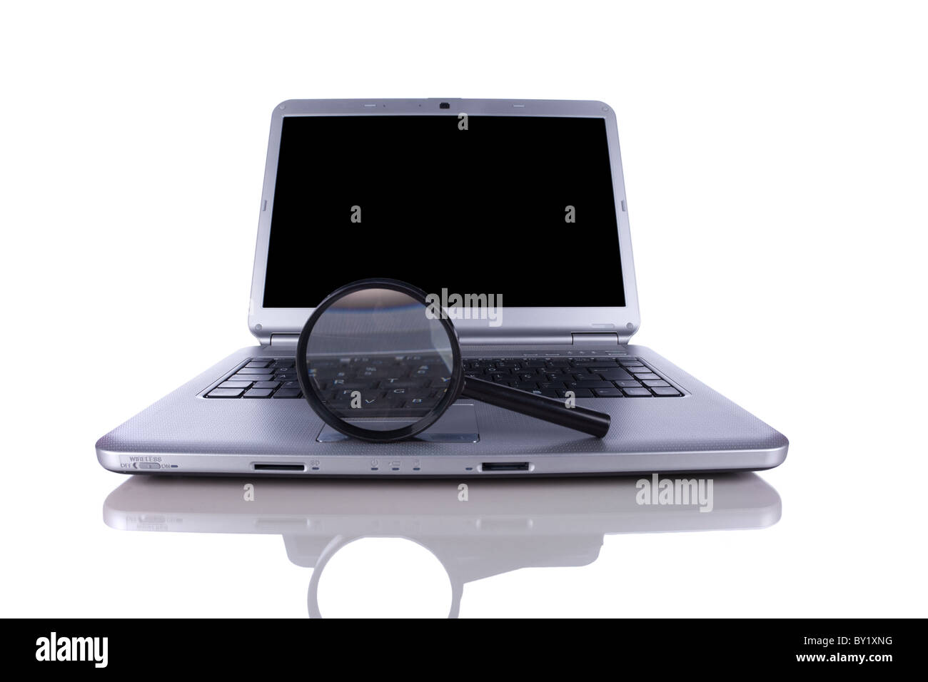 Laptop with a magnify glass to search online information (isolated on ...