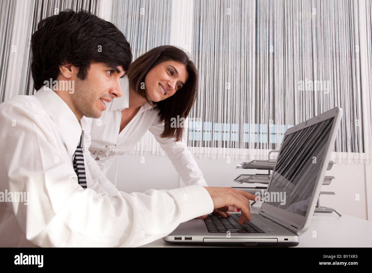 Modern team working at the office Stock Photo - Alamy