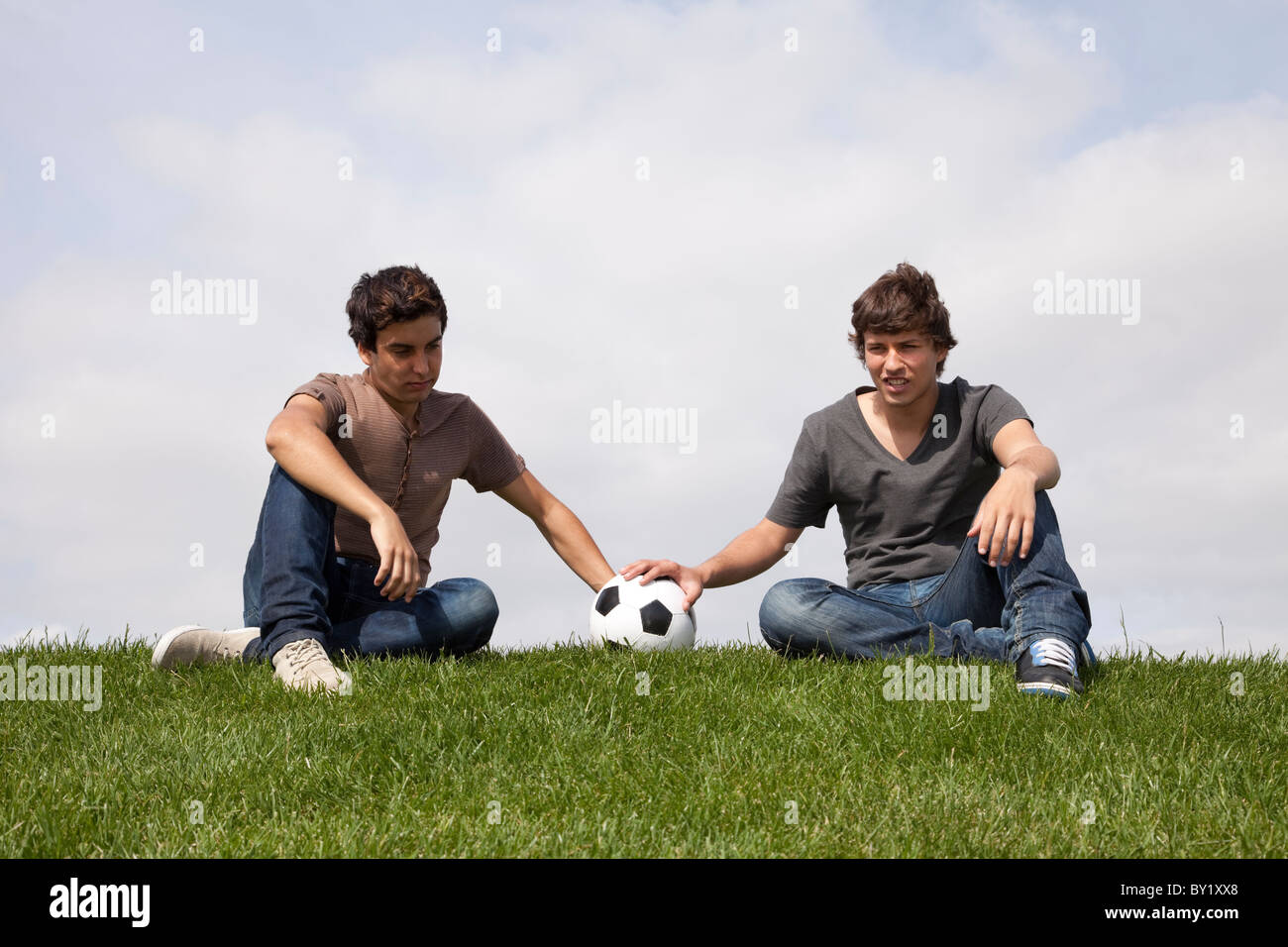 Sad soccer fans after their team lost in a match Stock Photo - Alamy